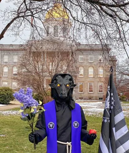 Satanic Temple installs holiday display in front of New Hampshire State ...
